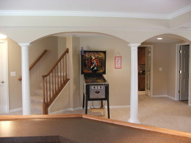 Two Ways to Hide Basement Poles - NOVA Basement Remodeling